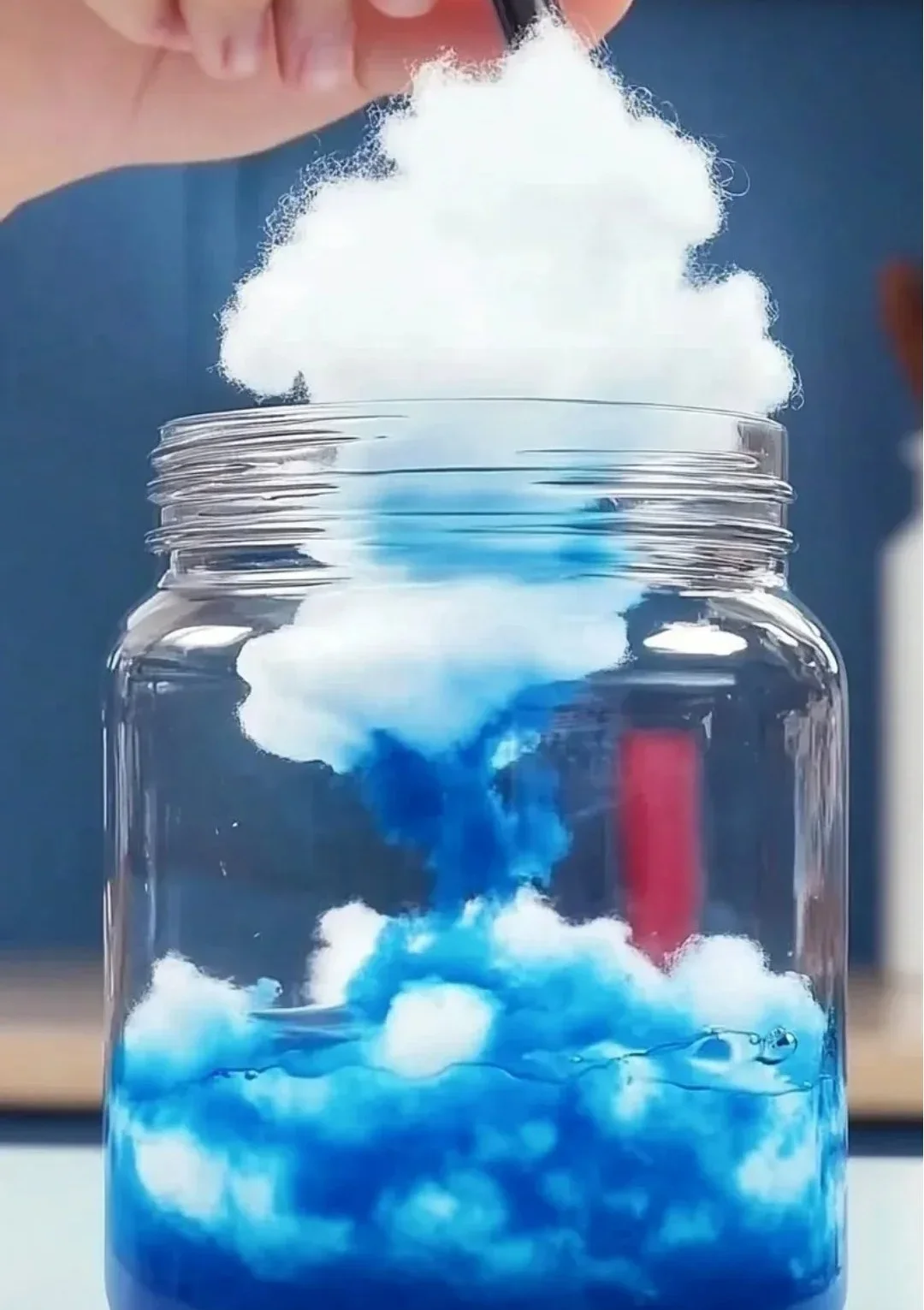 Watch tiny clouds burst and rain fall right before your eyes—a magical ...